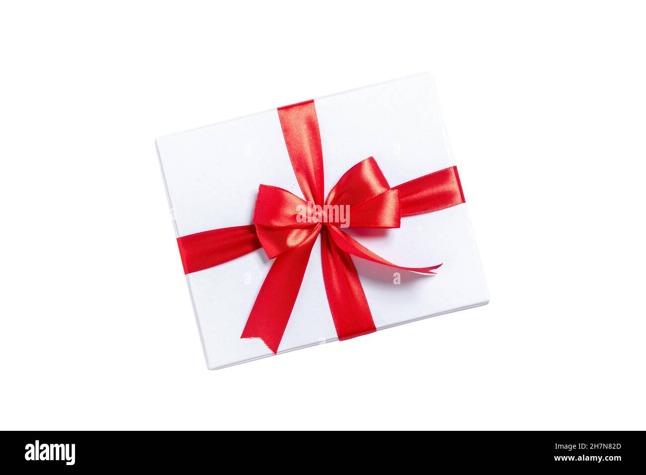 White gift box with red ribbon isolated over white background Stock ...