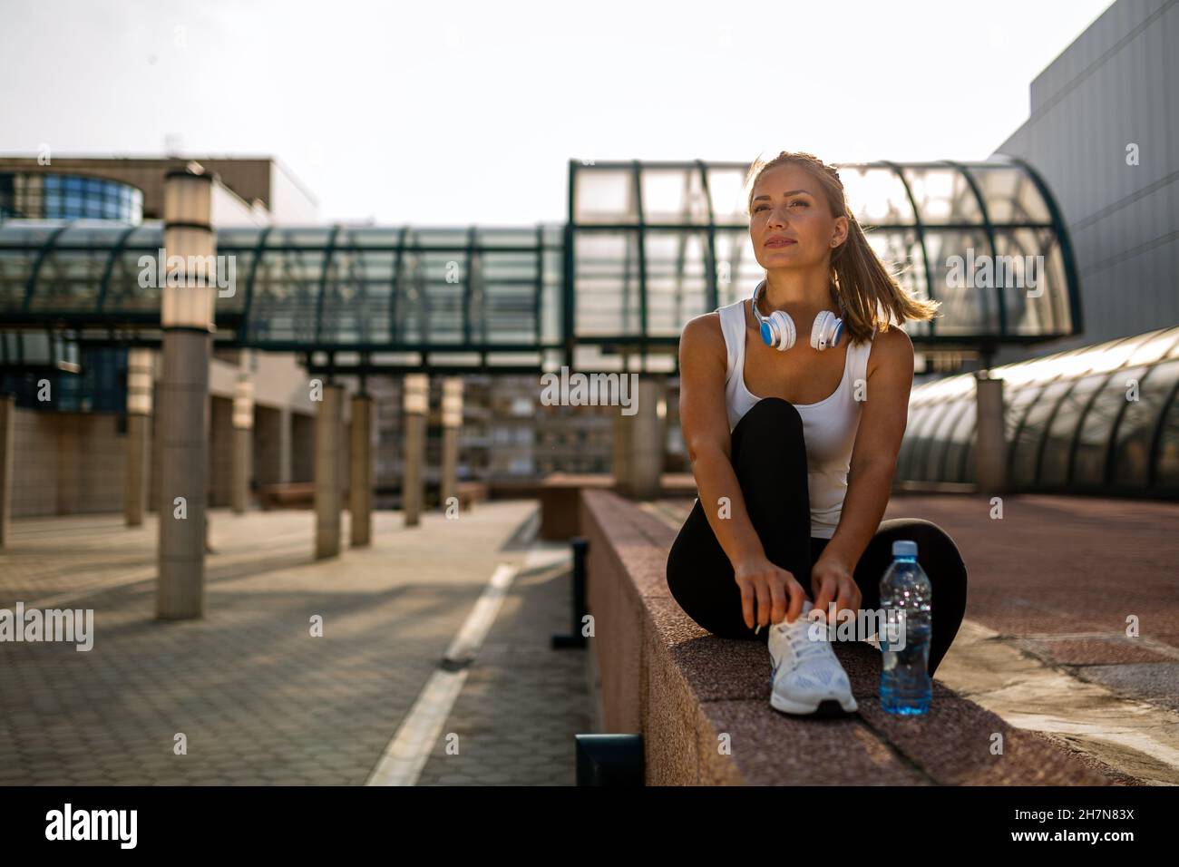 Portrait of attractive fit woman enjoying running, healthy lifestyle ...