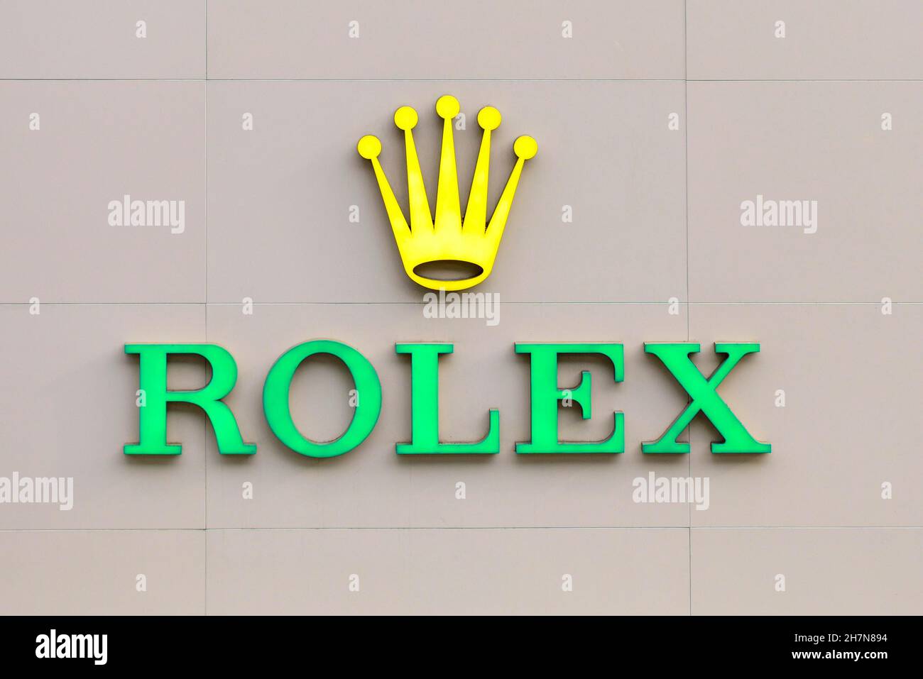 Logo Rolex illuminated Stock Photo - Alamy