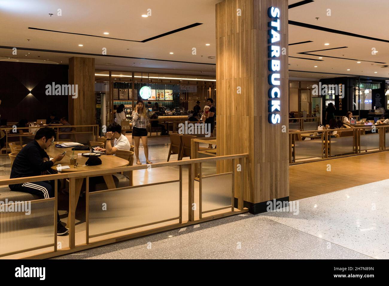 Starbucks lettering illuminated Stock Photo - Alamy