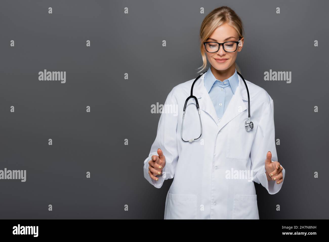 Young beautiful blonde doctor hi-res stock photography and images - Alamy