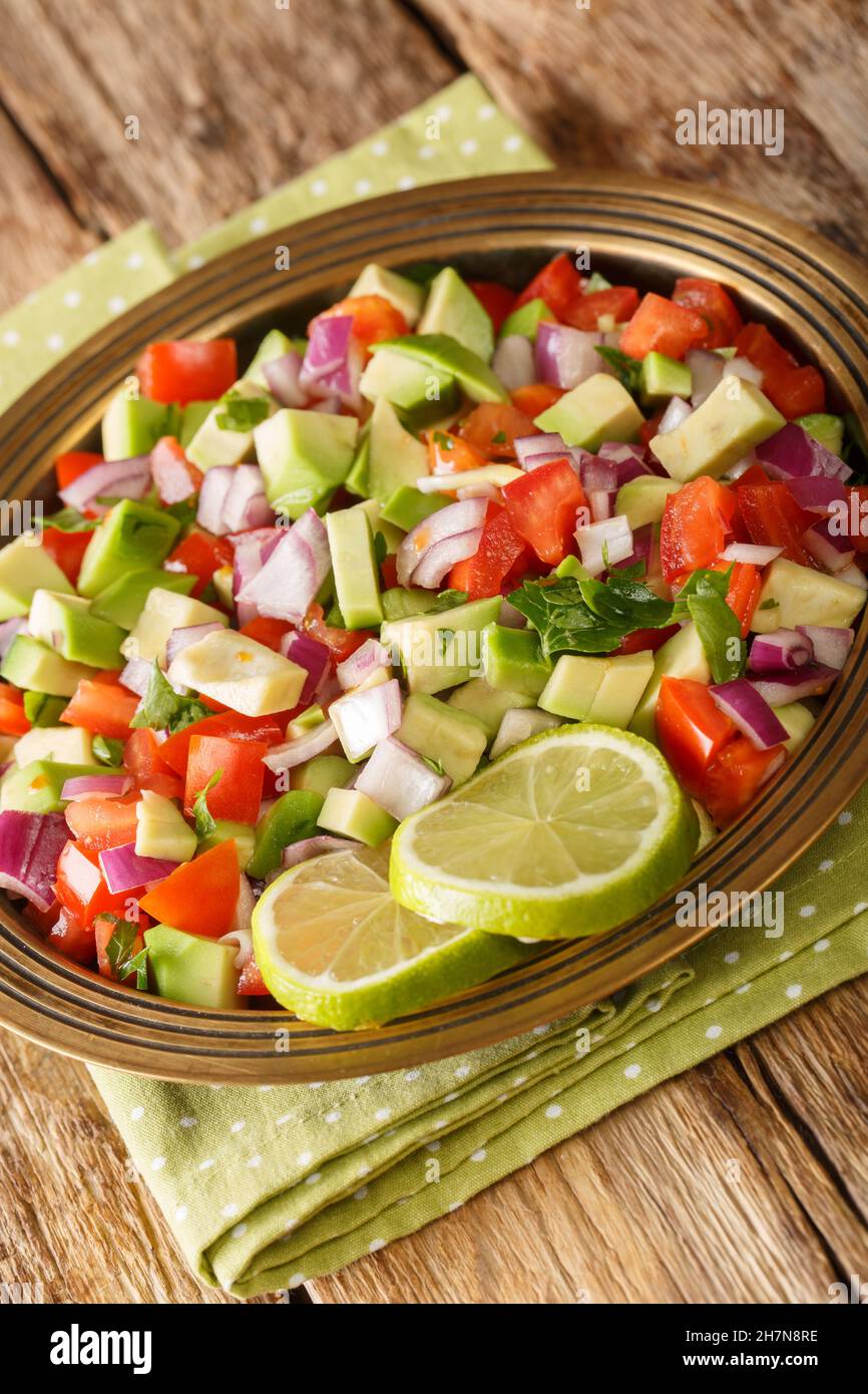 Kachumbari Kenyan Fresh Tomato and Onion Salad close up in the plate ...