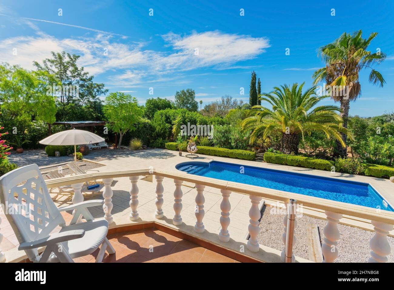 Luxurious house with a terrace, in a classic style with columns and a ...