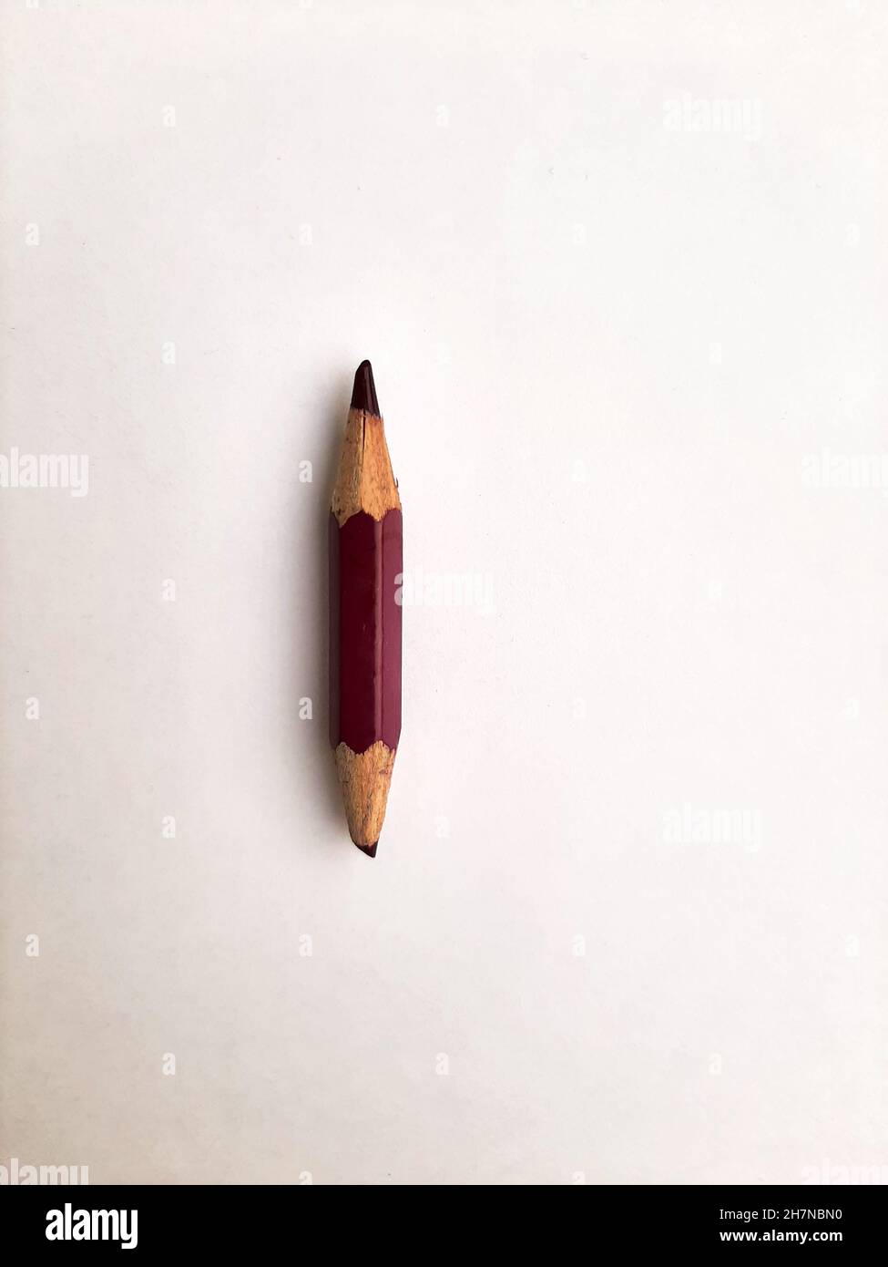 Small wooden pencil. Short pencil. Biten wooden pencil Stock Photo - Alamy
