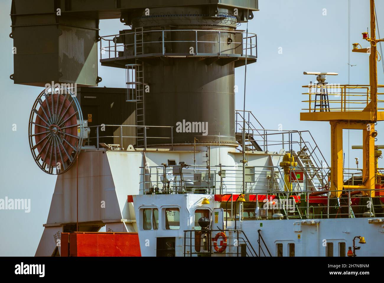 Hose outside modern industrial ship Stock Photo - Alamy