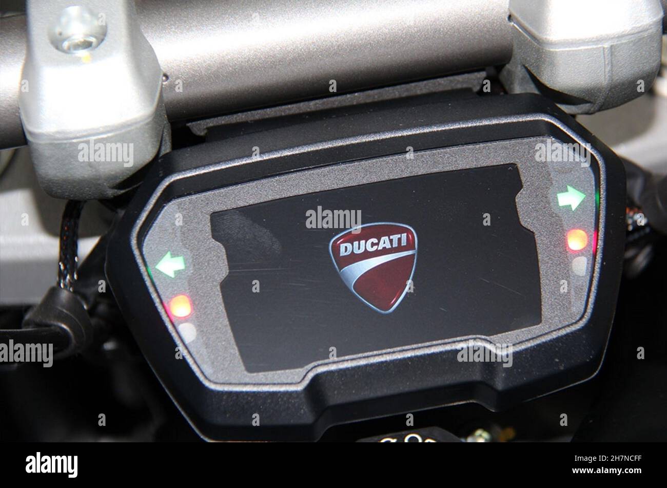 Ducati Diavel motorcycle: Close up on the instrument panel lit with the ...