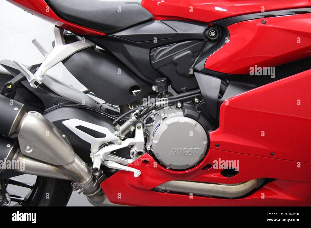 Moto Ducati 959: Close-up on the engine and fairing, red color ...