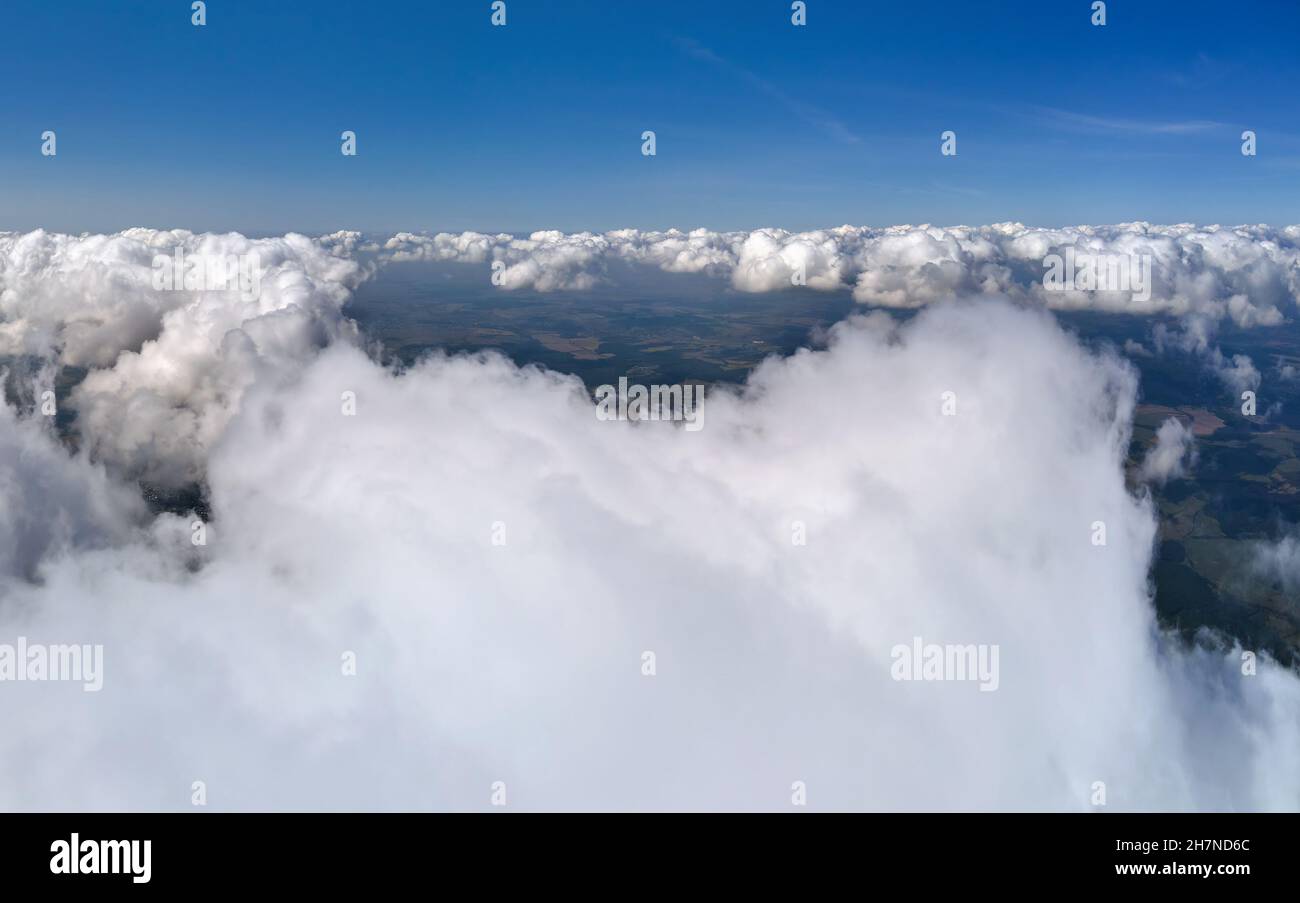 Aerial view from airplane window at high altitude of earth covered with ...