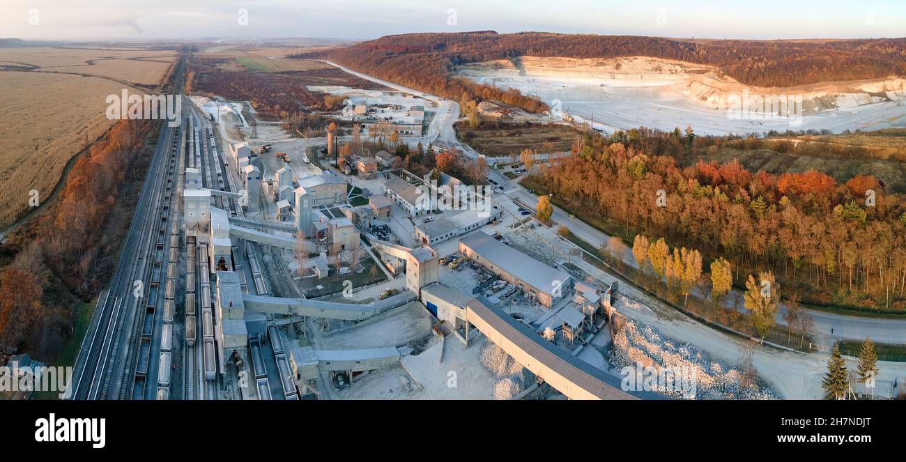 Aerial view of cargo train loaded with crushed sandstone materials at ...