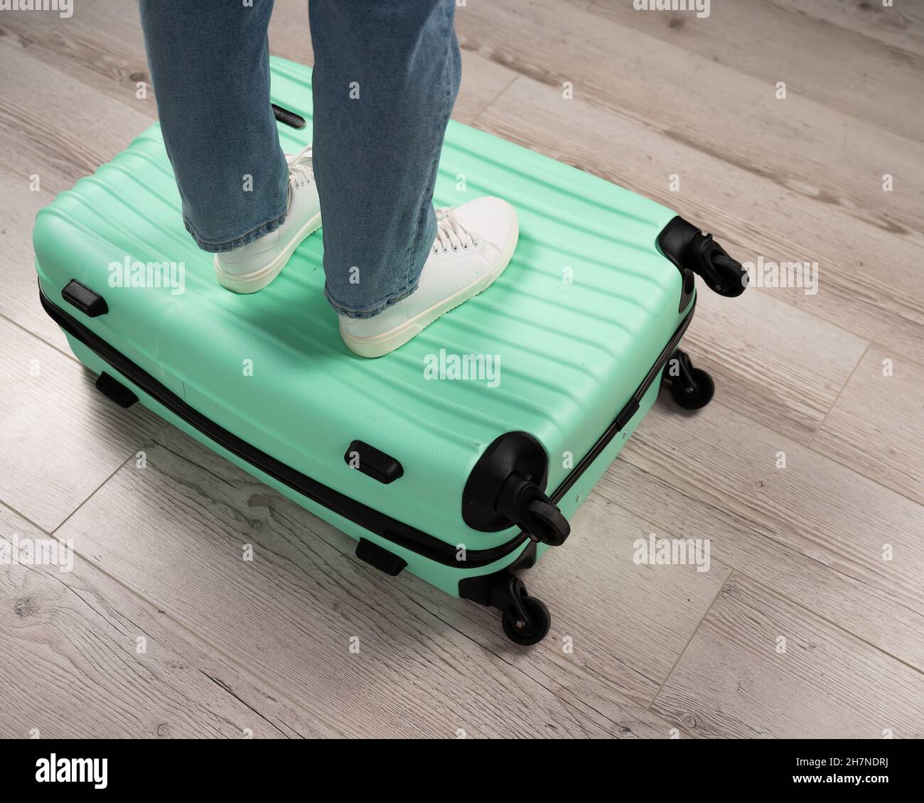 Suitcase feet hi-res stock photography and images - Alamy