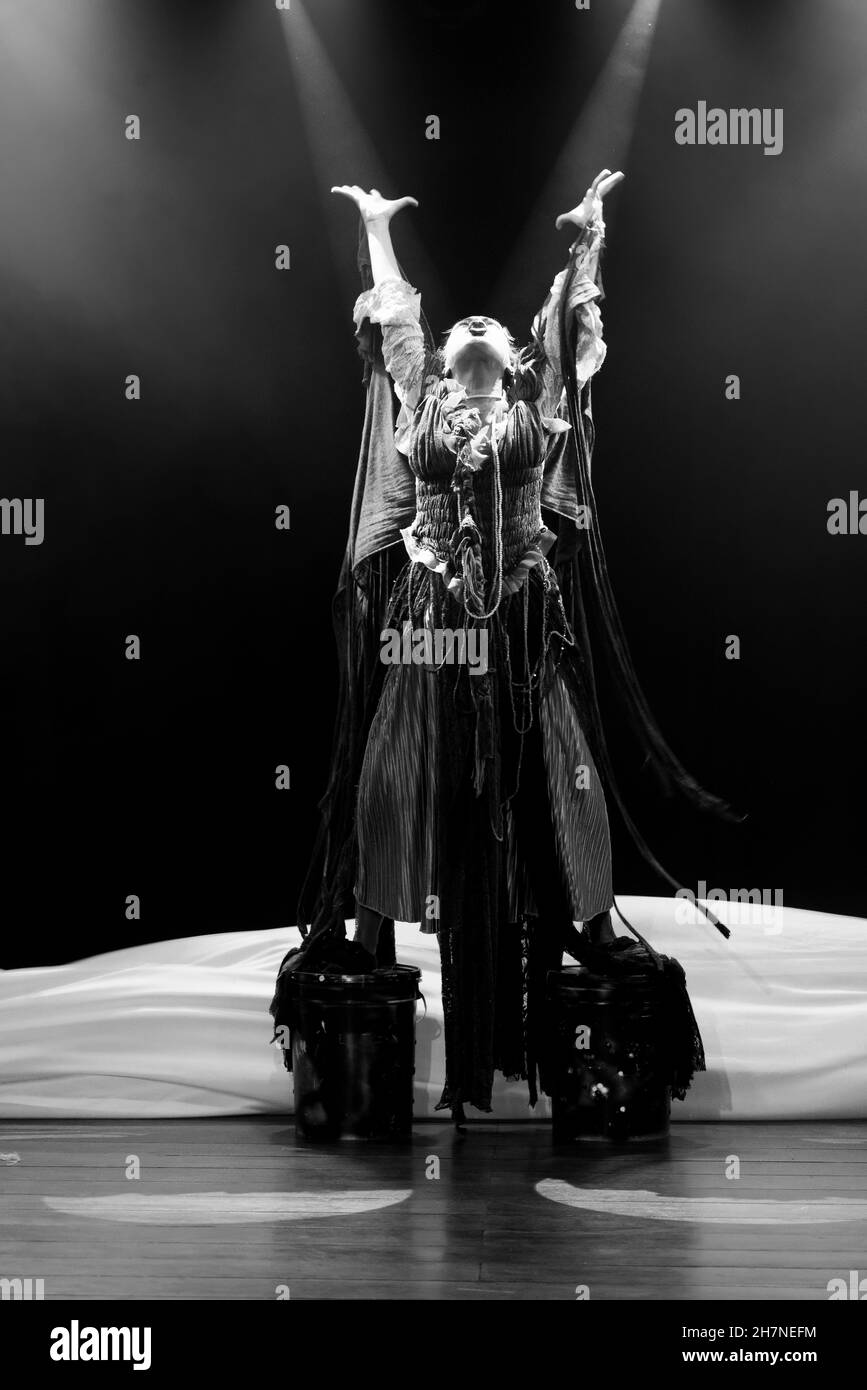 actress representing a character on the stage of a theater. He makes ...