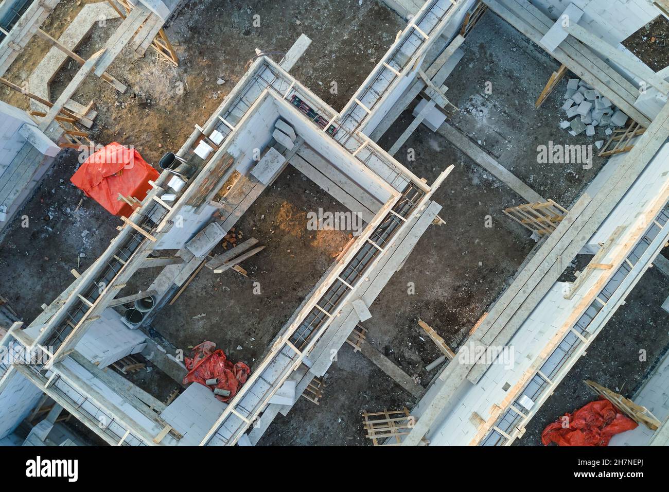 Aerial view of unfinished frame of private house foundation under ...