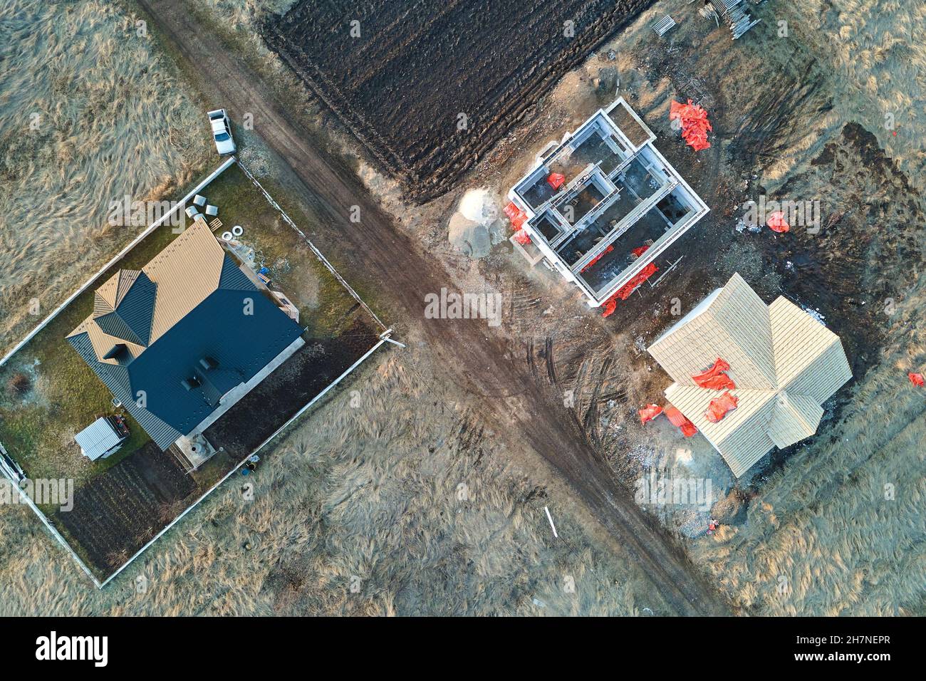 Aerial view of unfinished frame of private house foundation under ...