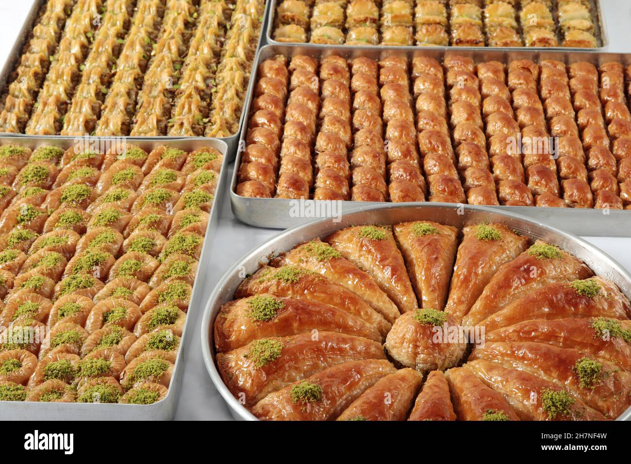 Traditional Turkish dessert Baklava. Varieties with pistachio, walnut ...