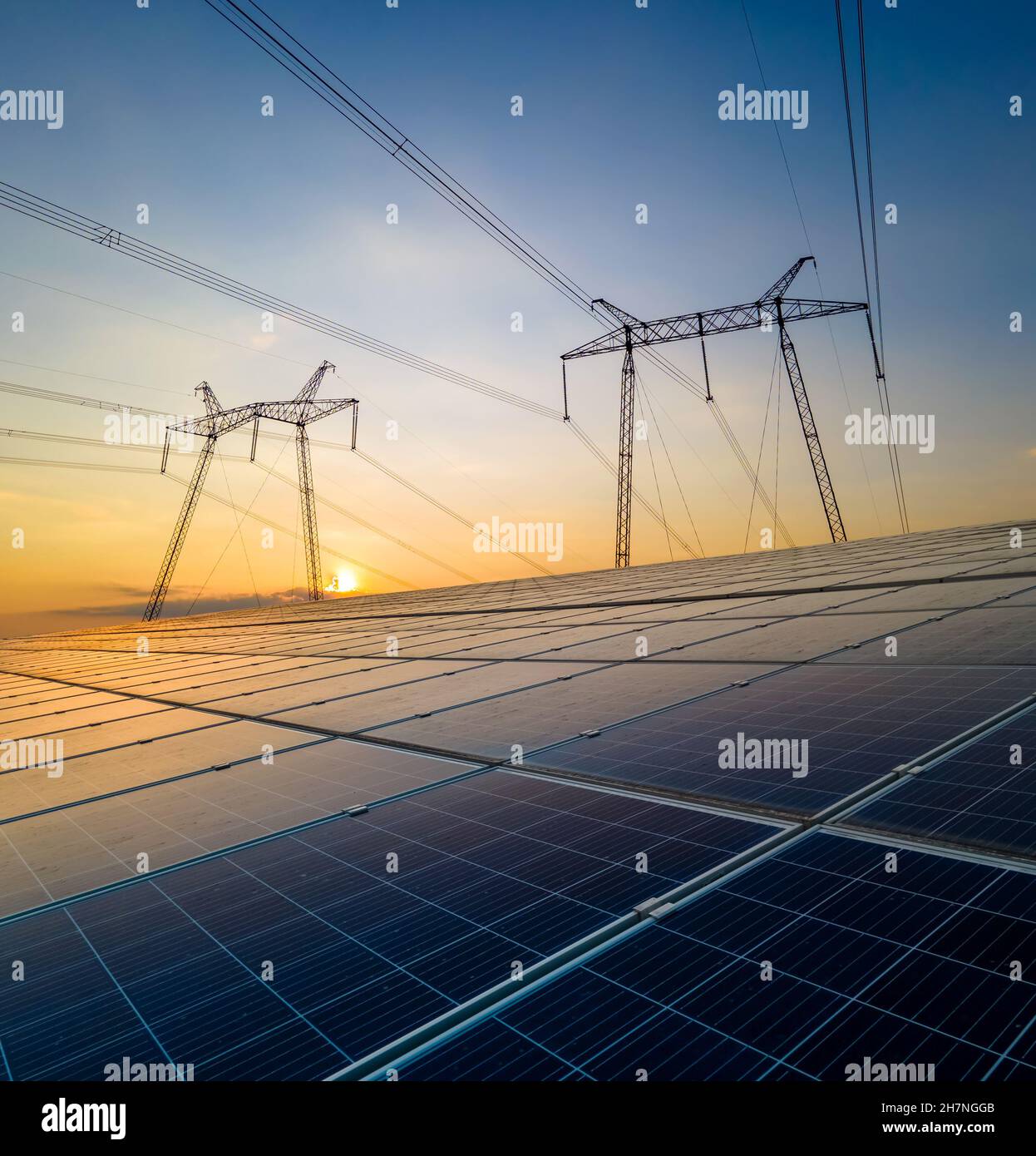 High voltage pylons with electric power lines transfering electricity ...