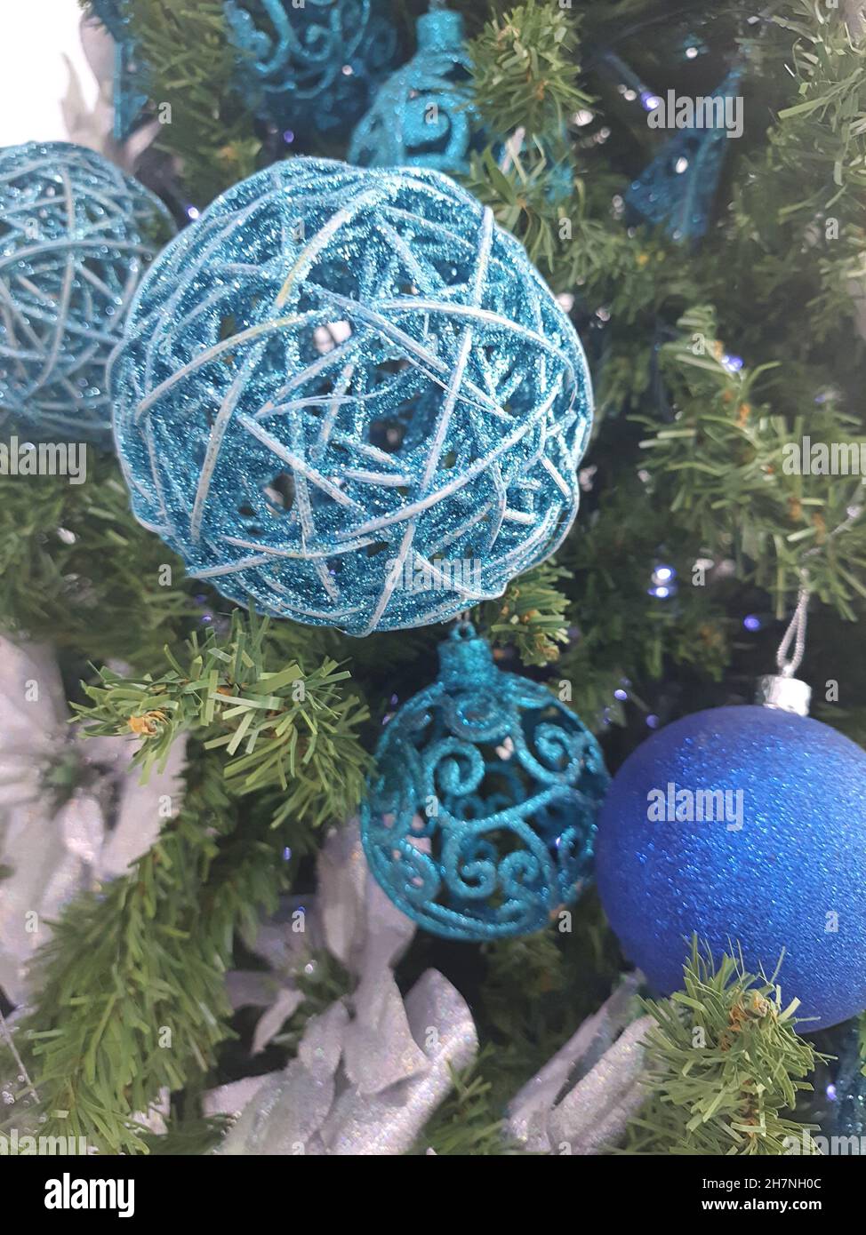 Christmas tree with ball made of string, blue glitter, intertwined ...