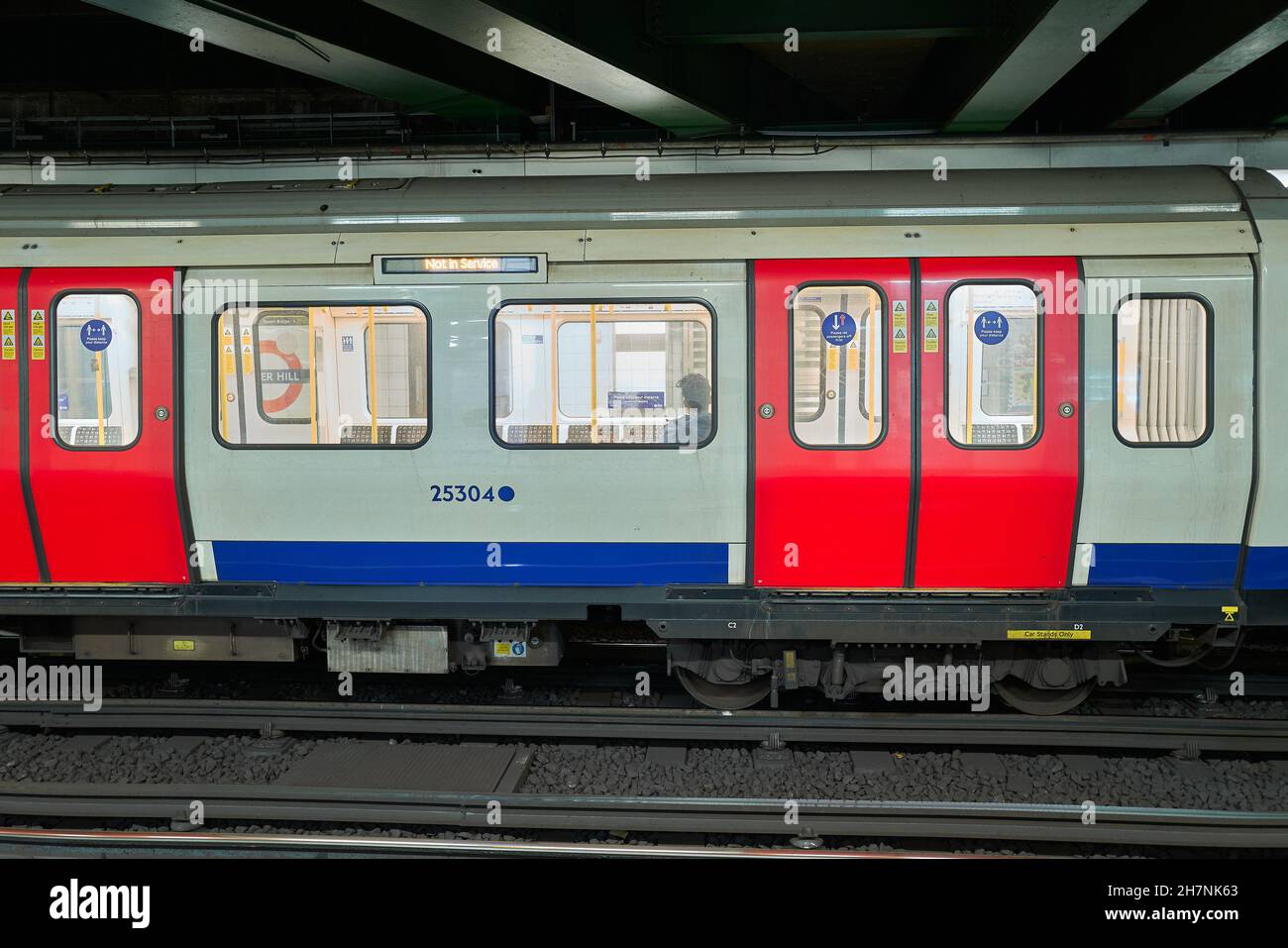 Tube train on the underground railway, London, England Stock Photo - Alamy