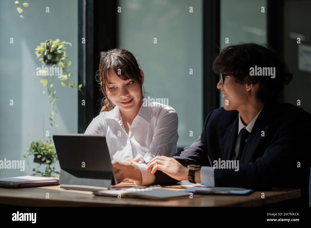 University asian students learning language using digital tablet and ...