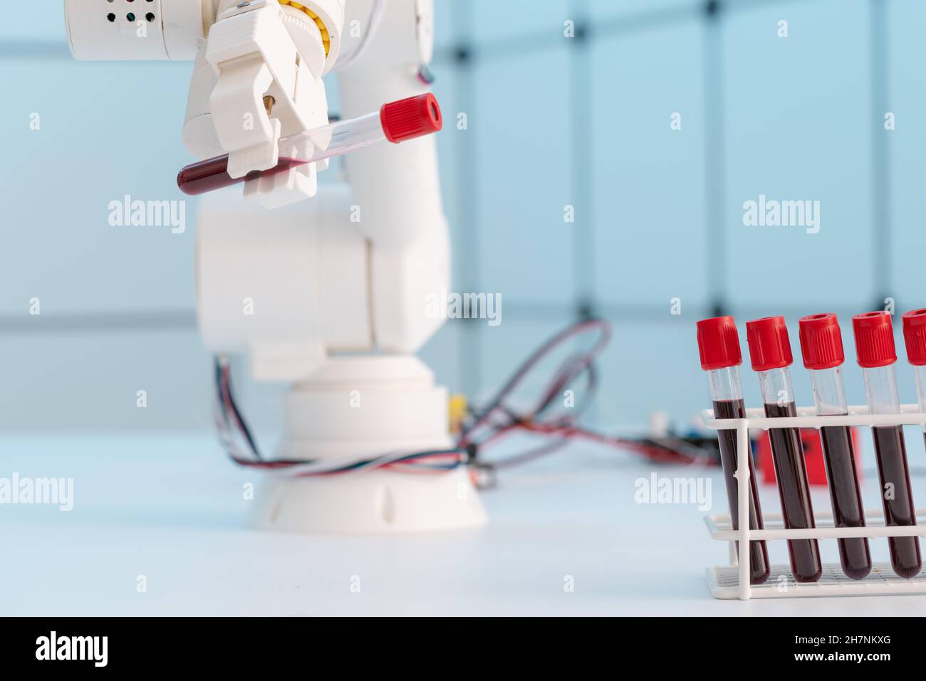Robot arm with test tube for biological experiments in laboratory Stock ...