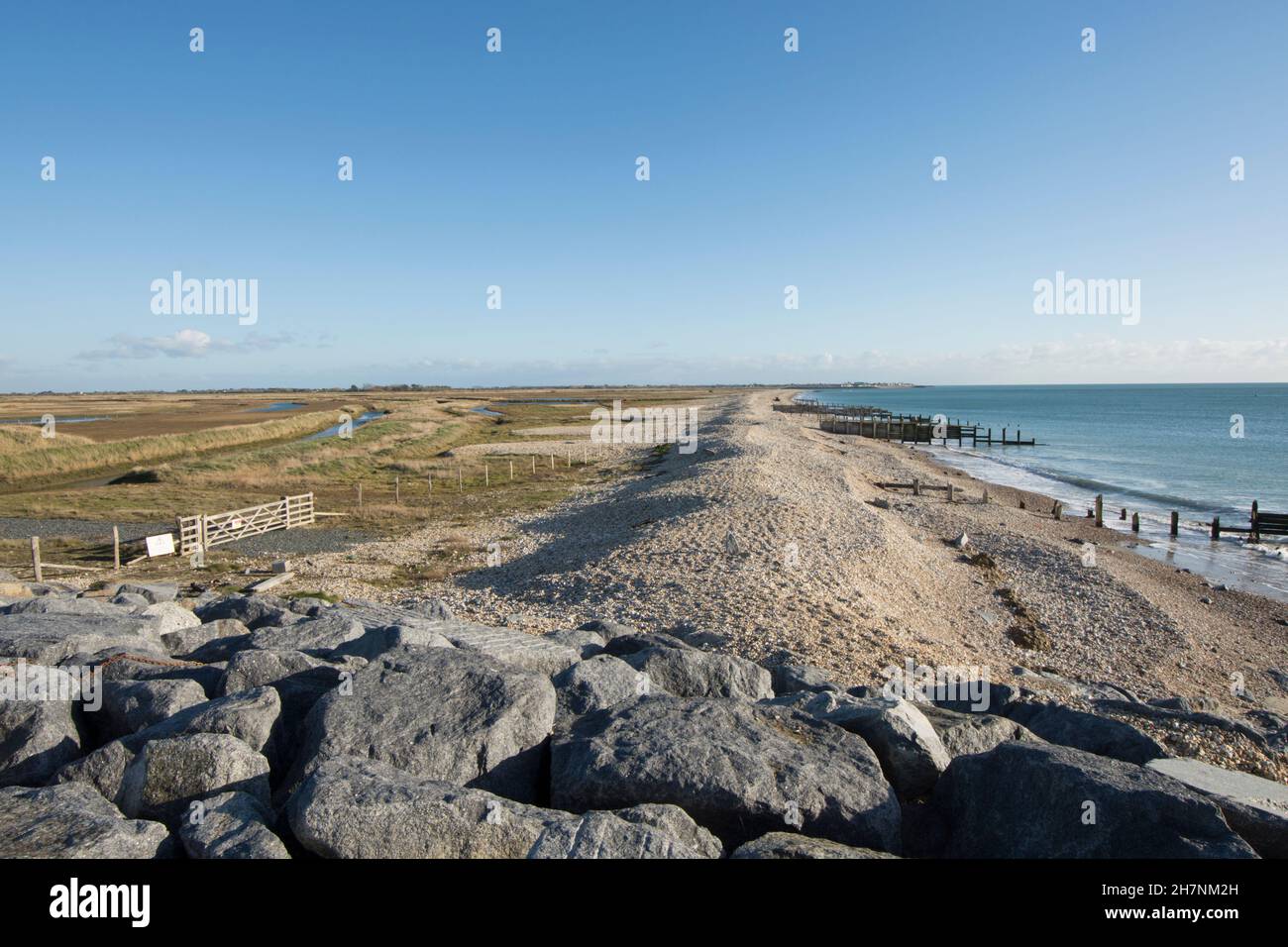 abandoned sea defences,erosion, stone groynes, pebbles and stones ...
