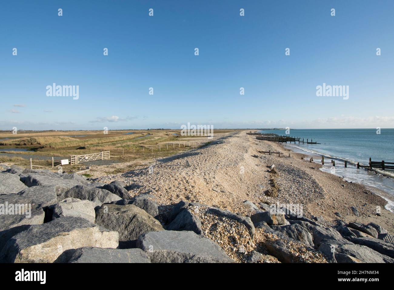 abandoned sea defences,erosion, stone groynes, pebbles and stones ...