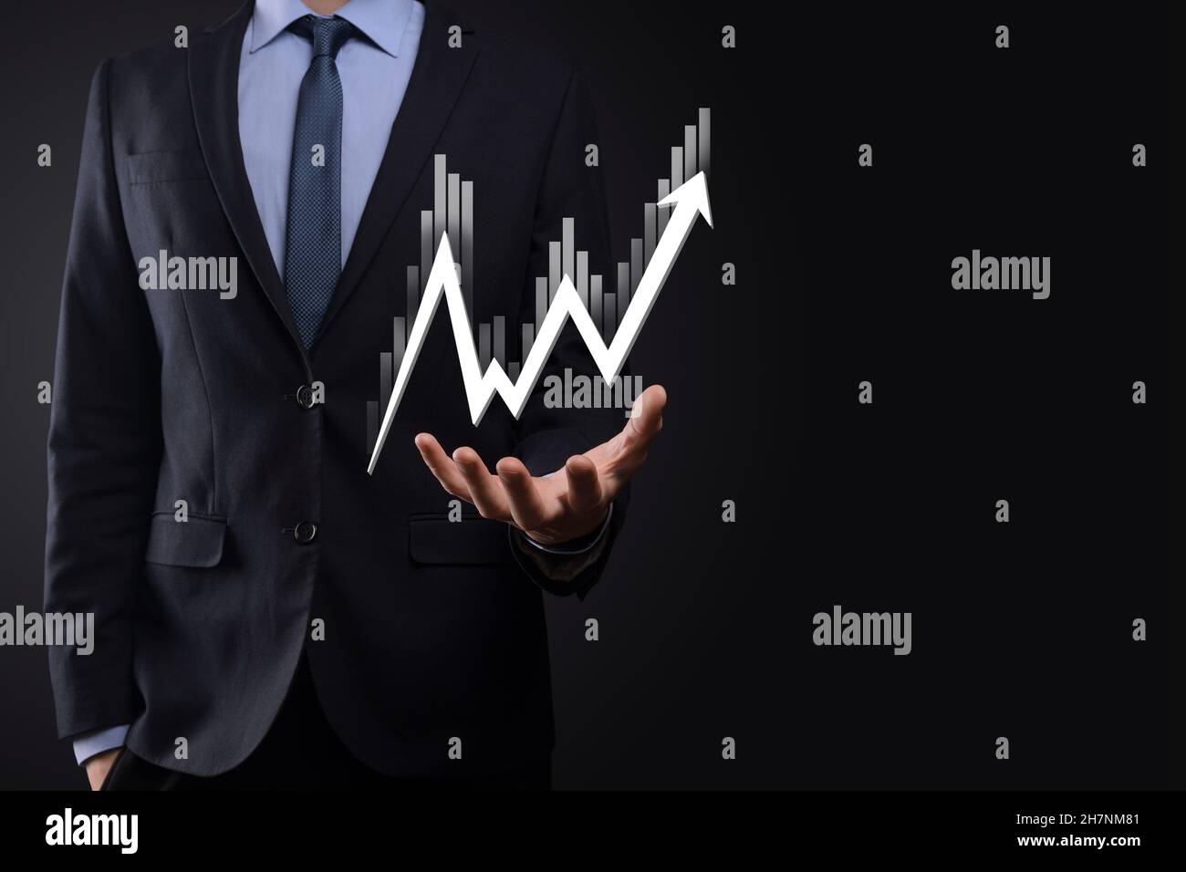 Businessman hold sales data and economic growth graph chart. Business ...