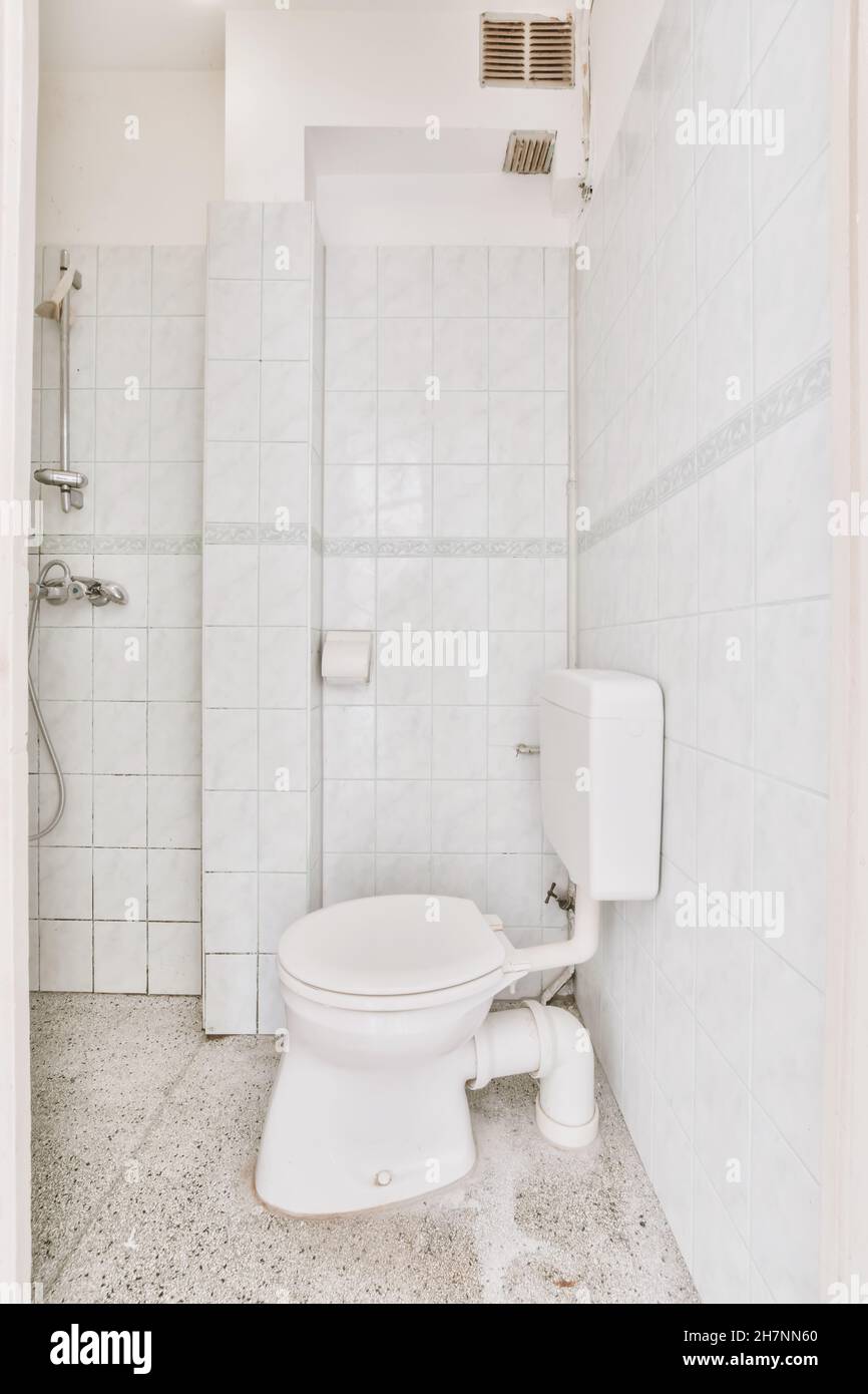 Interior of bathroom with toilet and shower Stock Photo - Alamy