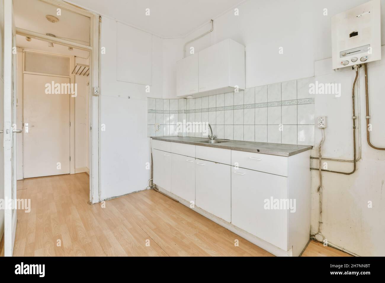 Small bright cozy kitchen in a beautiful apartment Stock Photo - Alamy