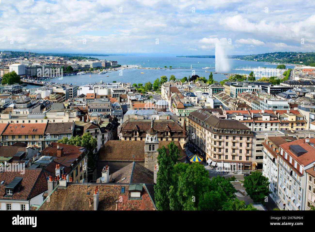Geneva cityscape with roofs, houses, lake and fountain Stock Photo - Alamy