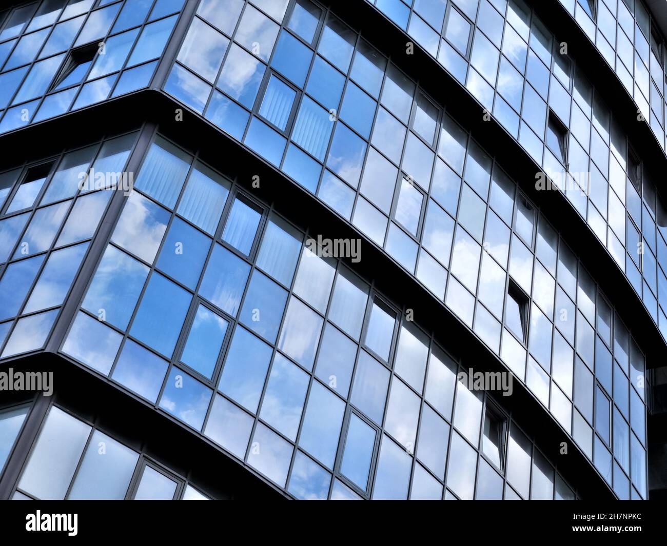 Modern glass building with sky reflection. Abstract background Stock ...