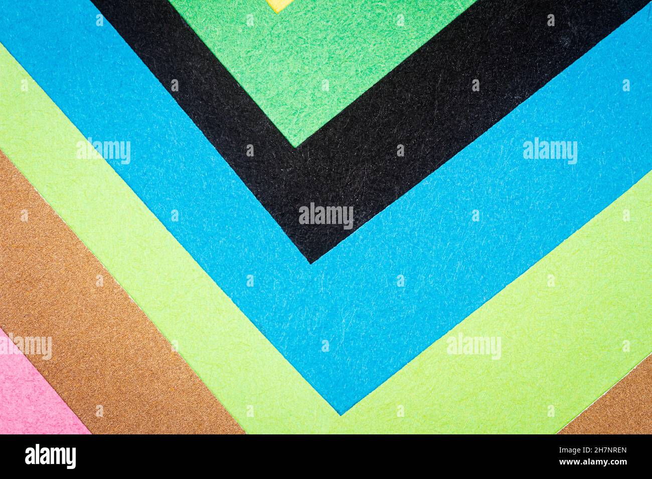 Multicolor background from a paper of different colors. Abstract ...