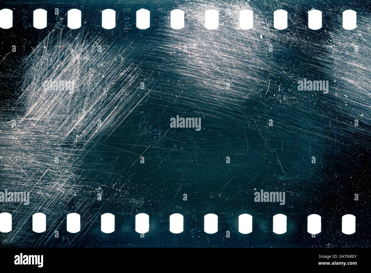 Dusty and grungy 35mm film texture or surface. Perforated scratched ...