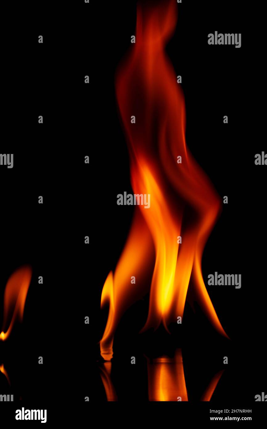 Fire flames isolated on a black background Stock Photo - Alamy