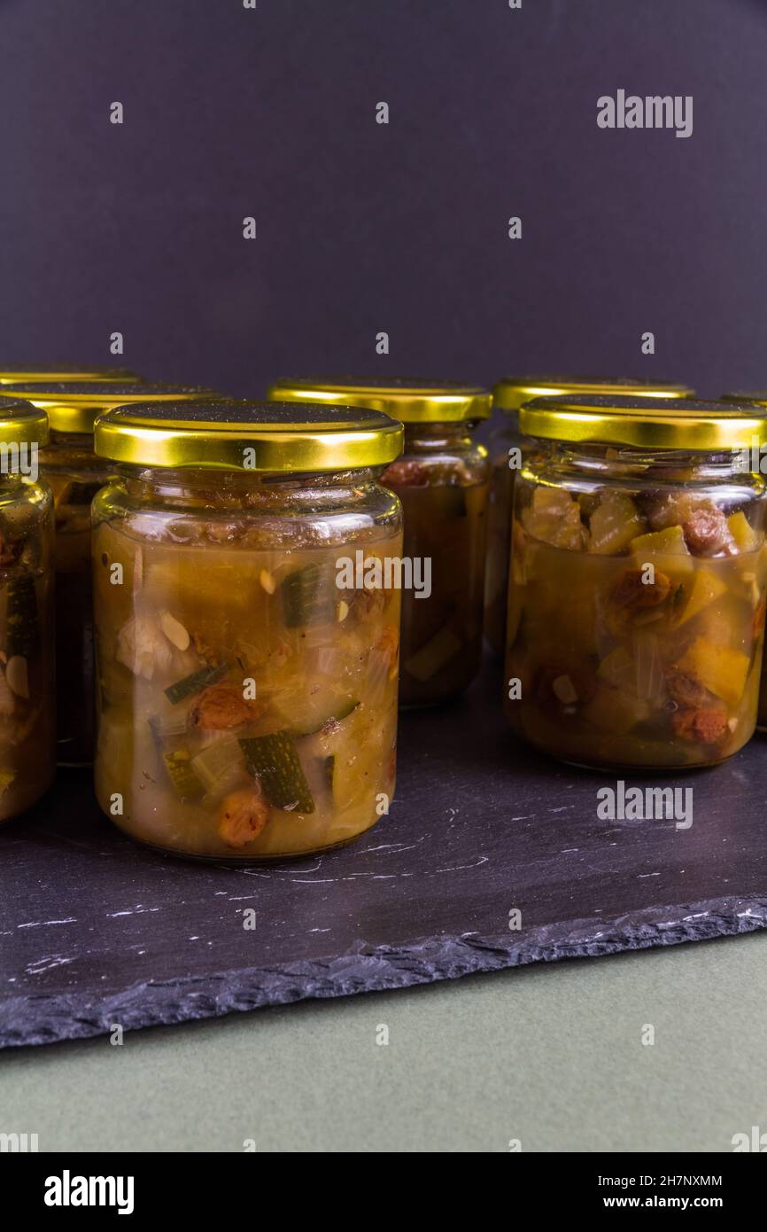 Chutney after courgette grew into marrow. Several jars black dark ...