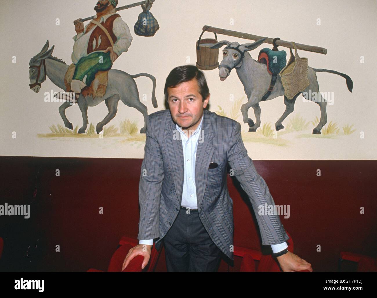 Jacques Mailhot in front of the Théâtre des Deux Ânes in Paris, which ...
