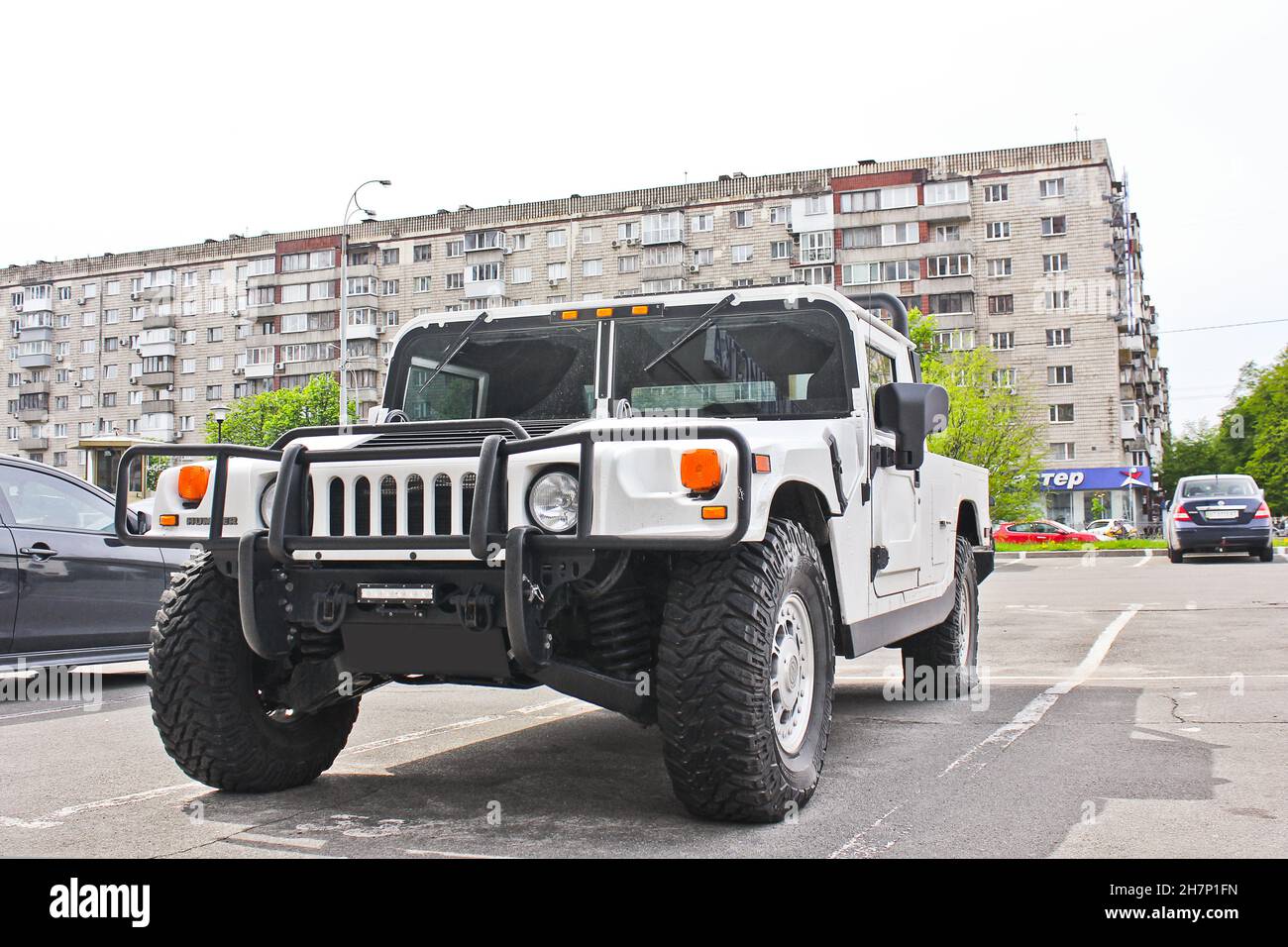 Kiev, Ukraine - April 27, 2014: White Hummer H1 in the city. Military ...