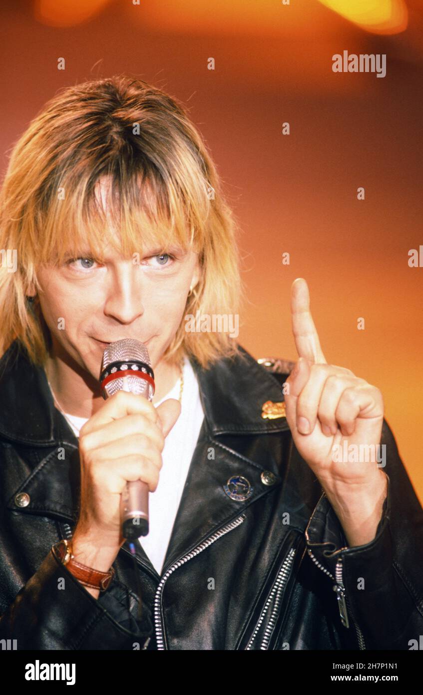 Renaud, French singer, on the set of the TV show "Champs Elysées" on ...