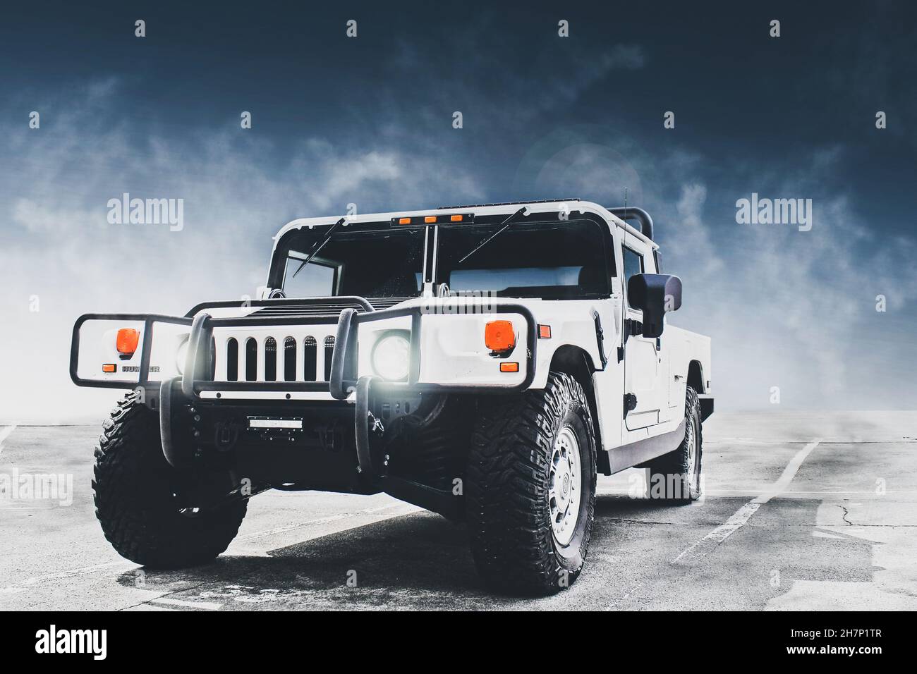 Kiev, Ukraine - April 27, 2014: White Hummer H1 on the background of ...