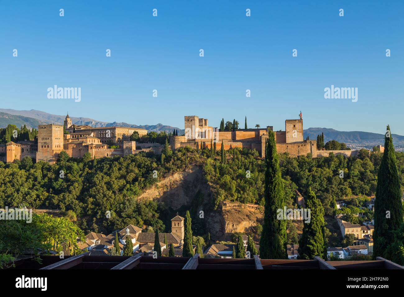 View of Alhambra Palace in Granada, Spain, with Sierra Nevada mountains ...