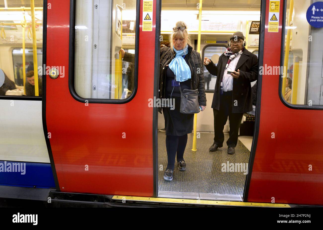 Man getting off a train hi-res stock photography and images - Alamy