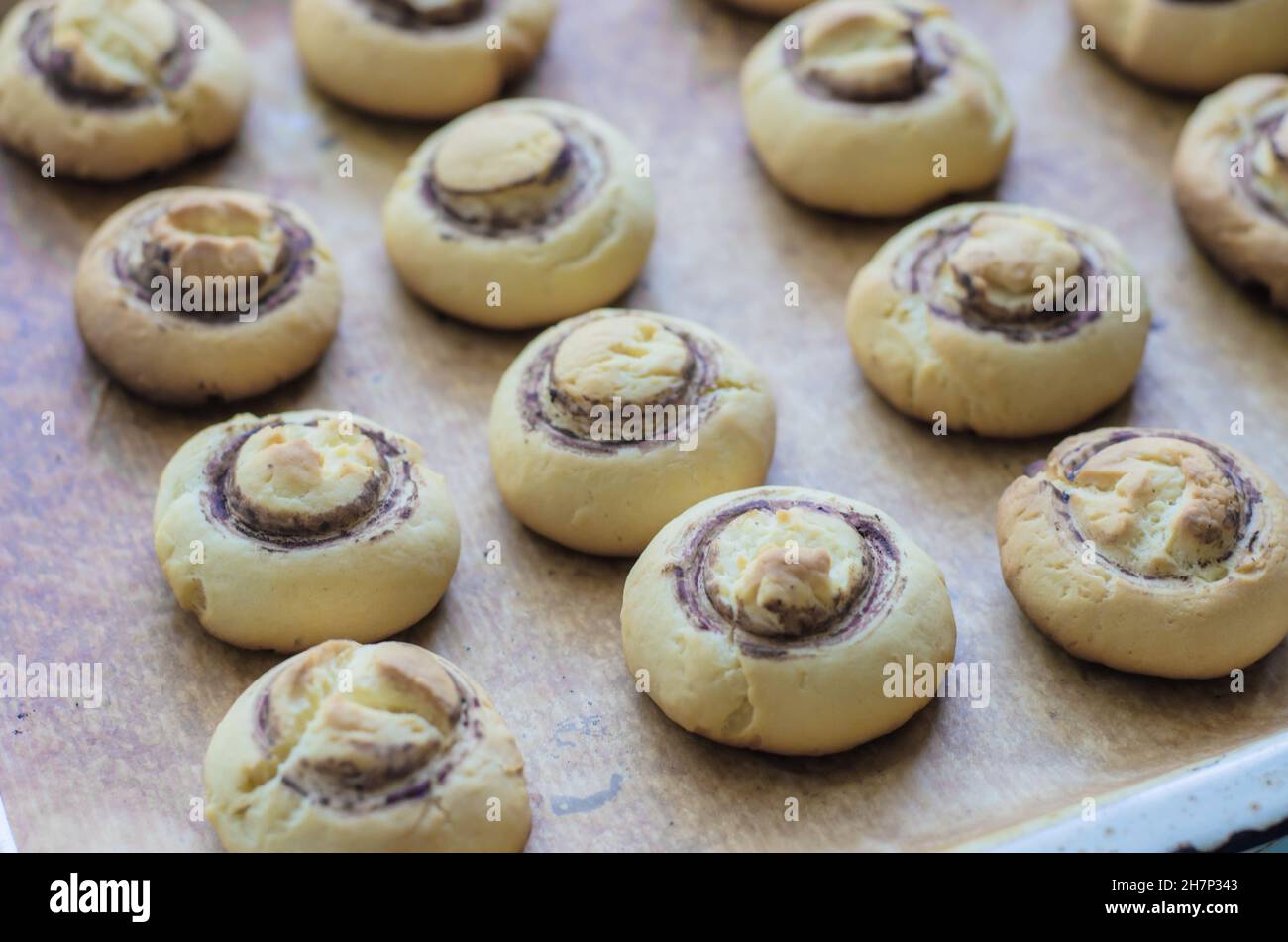 Homemade mushroom-shaped cookies on parchment paper. Shortbread Stock ...