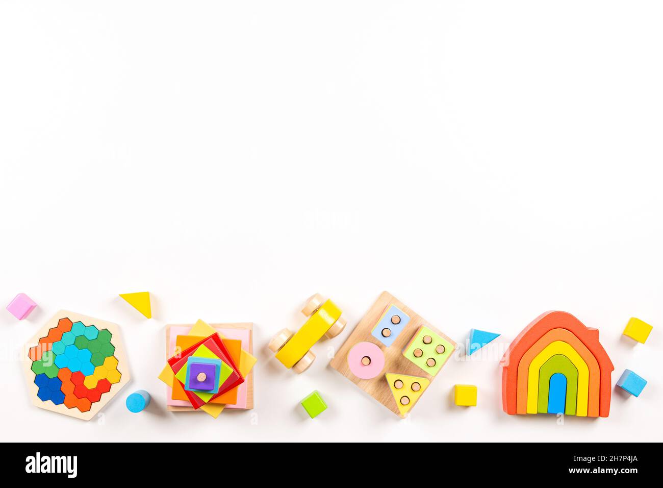 Baby kids toy frame background. Wooden educational toys on white ...