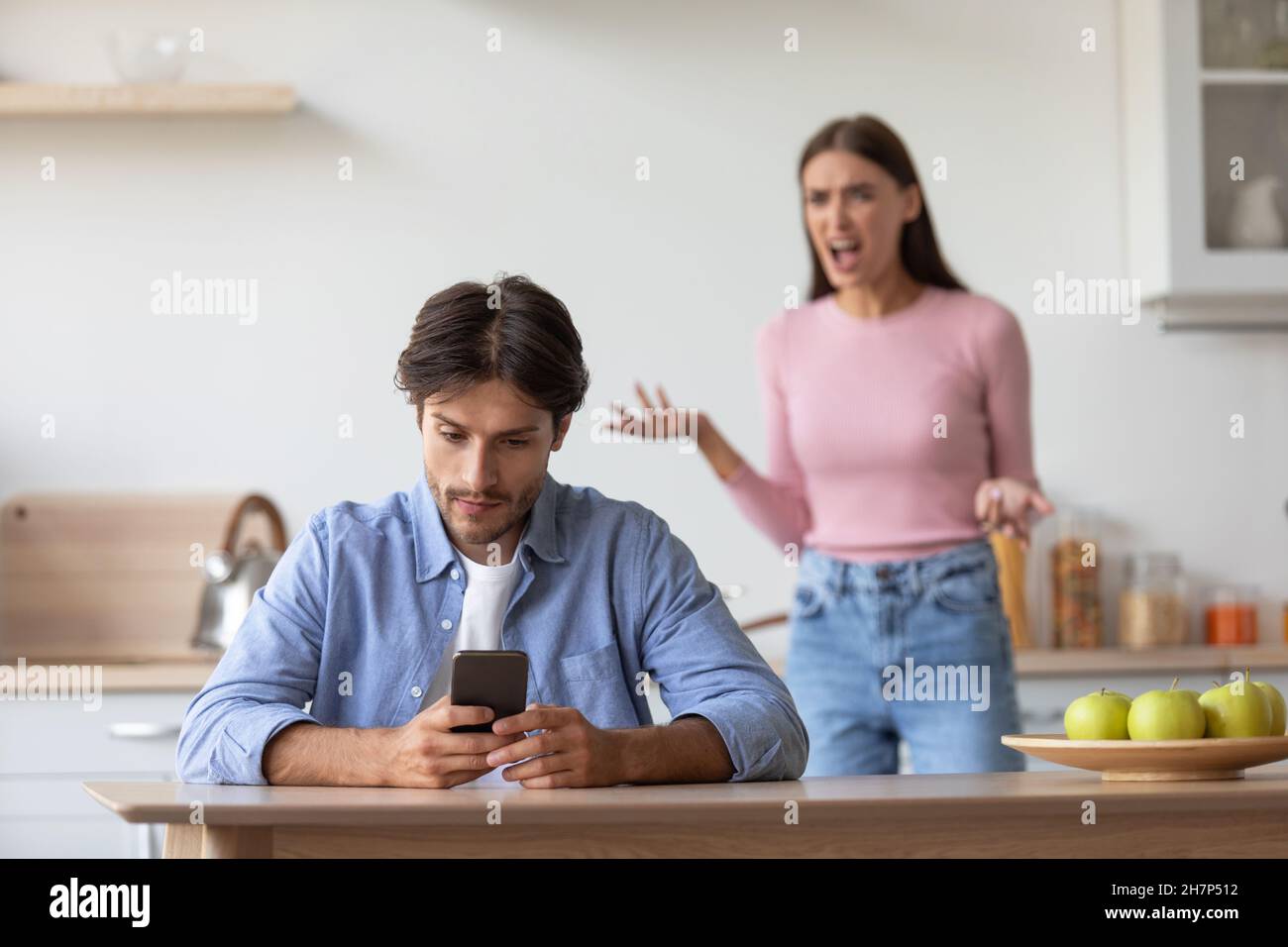 Woman scolding husband hi-res stock photography and images - Alamy