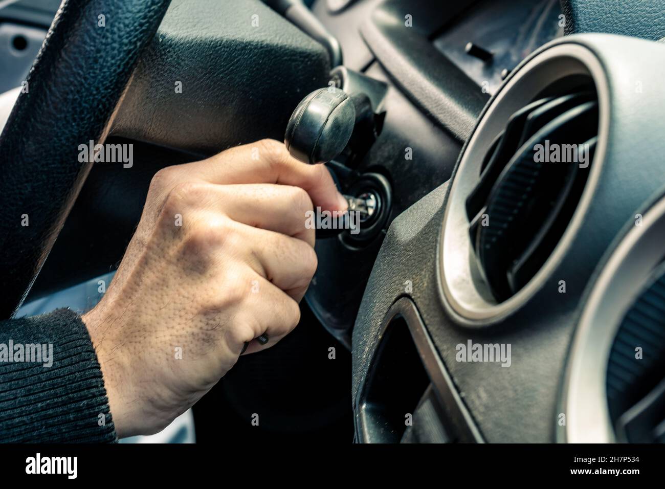 A Hand holding car key for starting the car Stock Photo - Alamy