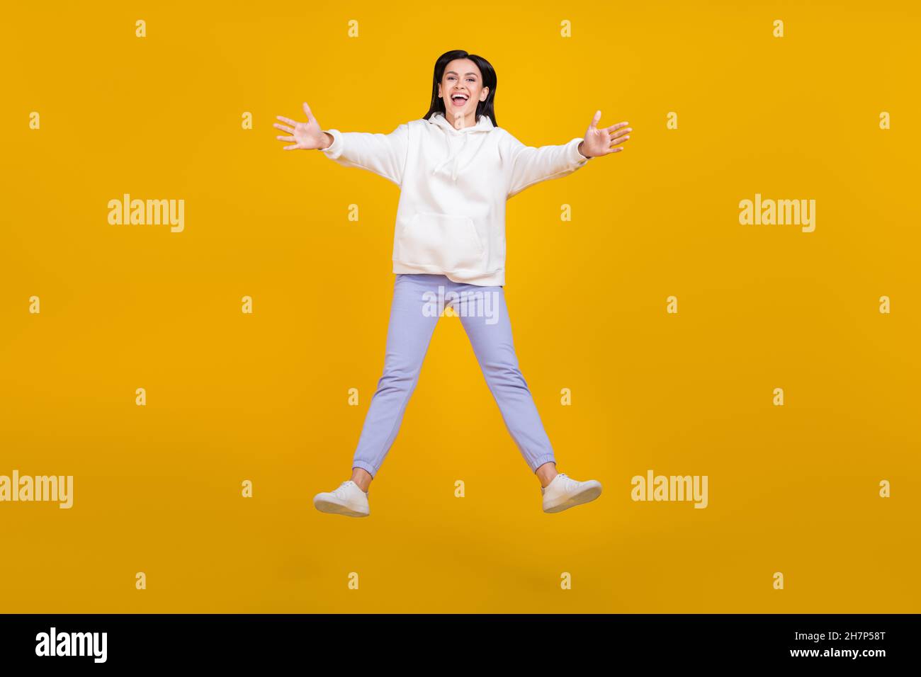 Full body photo of youngster lady jump cuddle best friend isolated over ...