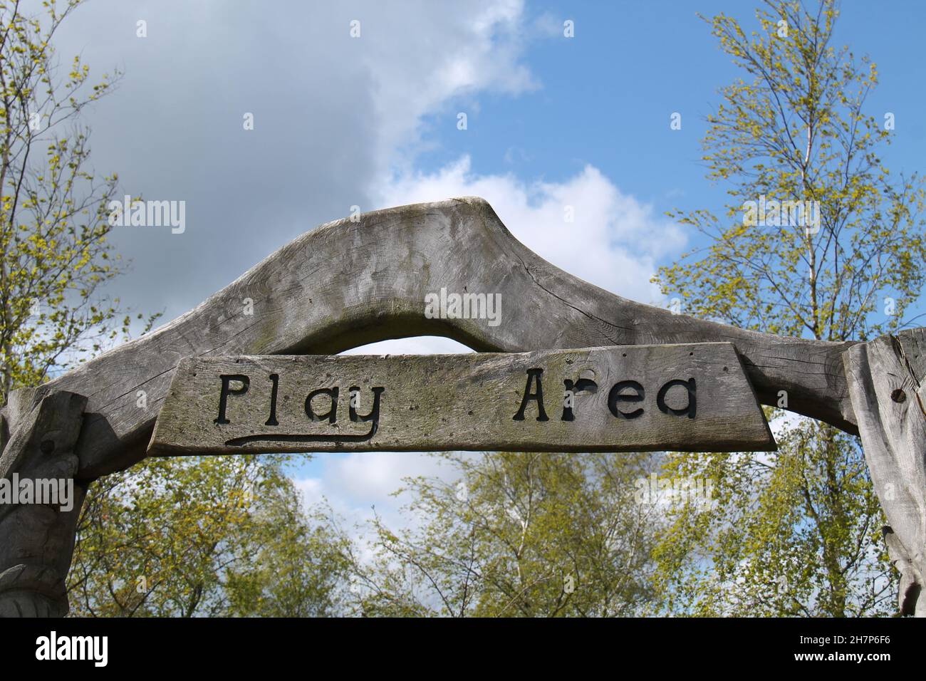 A Wooden Sign for a Childrens Woodland Play Area Stock Photo - Alamy