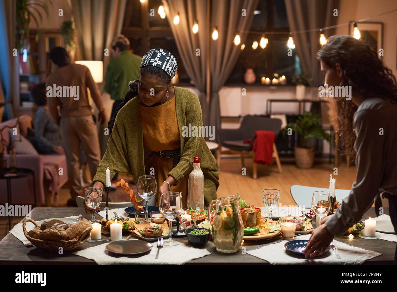 People Setting The Table