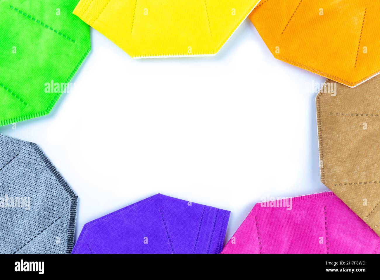 A Copy space round stack of different colors face masks respirators ... A Copy space round stack of different colors face masks respirators ...