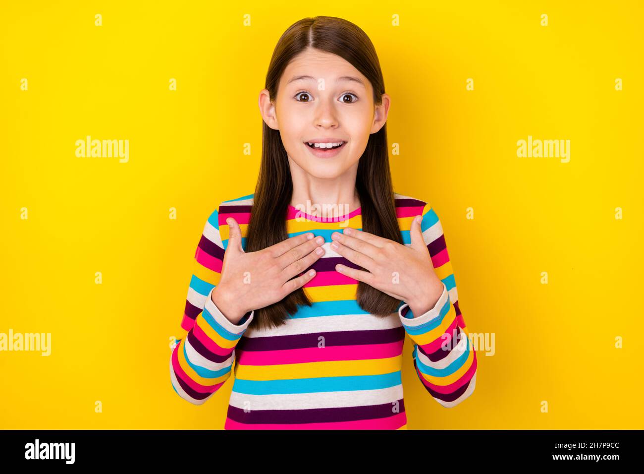 Photo of surprised funny small lady hands chest appreciate news wear ...