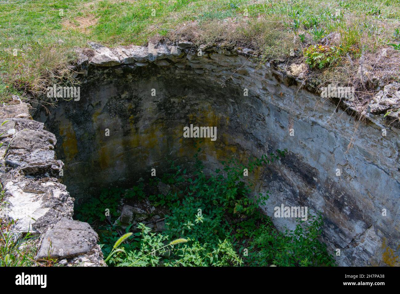 huge pit for storing water at the temple of Quetera Stock Photo - Alamy
